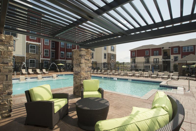 Upscale Pool Area stock image. Image of summer, lounge - 43401243