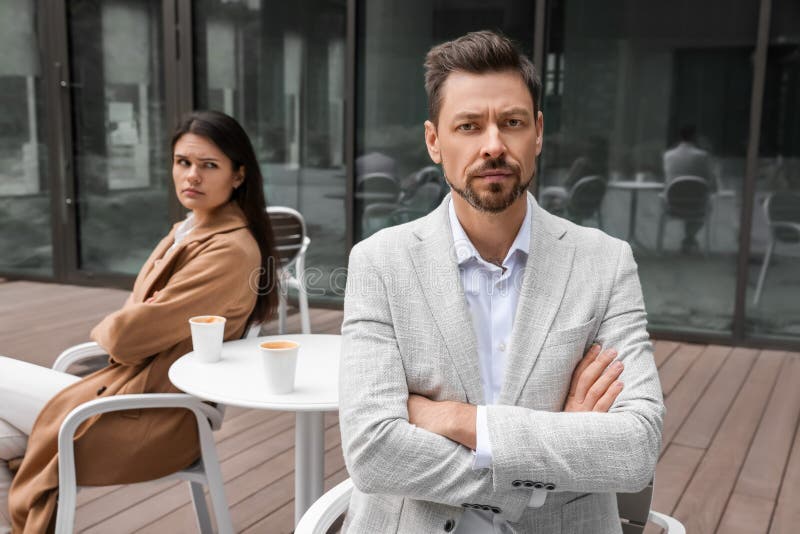 Upset Arguing Couple in Outdoor Cafe. Relationship Problems Stock Image ...