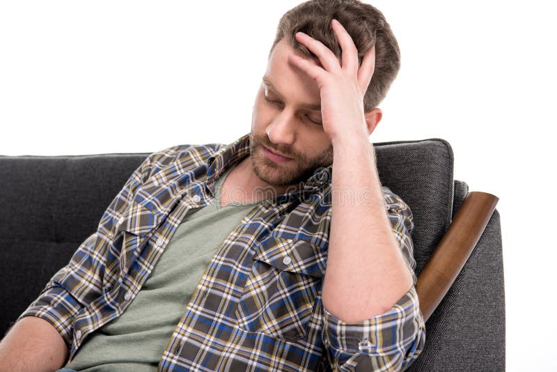 Upset Bearded Man Sitting on Armchair and Frustrated Woman Sitting on ... Upset Bearded Man Sitting on Armchair and Frustrated Woman Sitting on ...