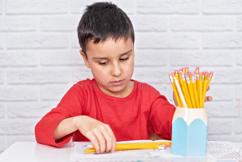 Upset Boring Schoolboy Doing Homework. Education, School, Learning ...