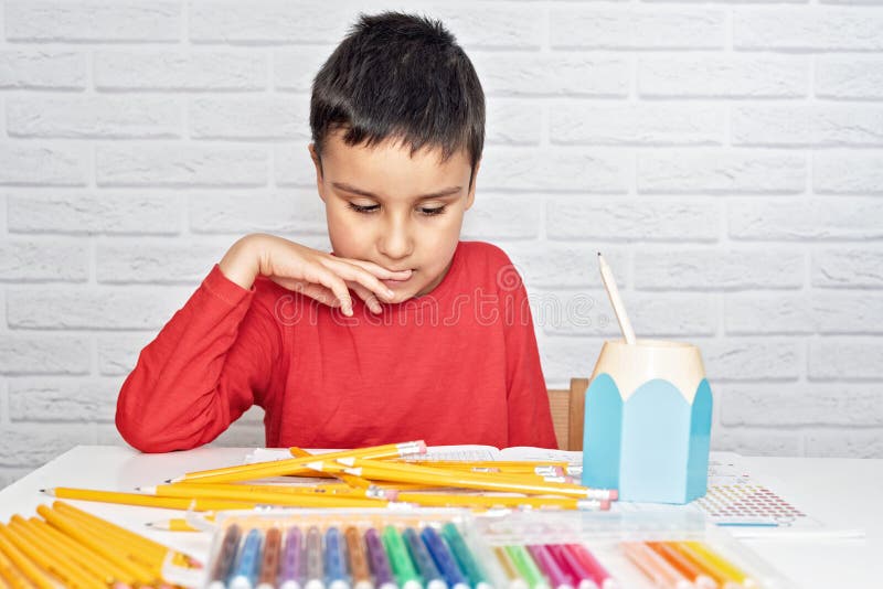 Upset Boring Schoolboy Doing Homework. Education, School, Learning ...