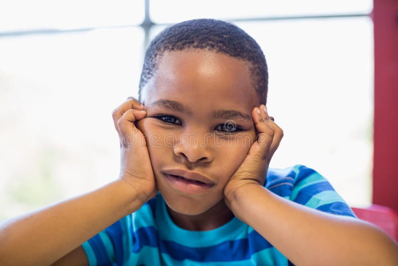 Upset Boy Sitting in Classroom Stock Image - Image of back, portrait ...
