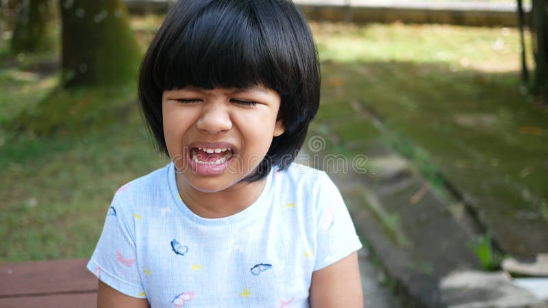 A Upset Child Girl Crying Outdoor Stock Video - Video of adolescent ...