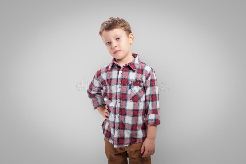 An Upset Child with a Sad Expression: Reflecting Emotions and ...