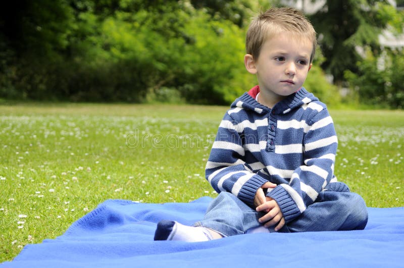 Upset Child Waiting in Park Stock Photo - Image of garden, emotions ...