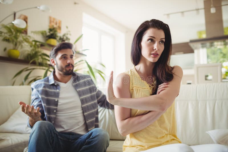 Upset Couple Arguing with Each Other on Sofa Stock Image - Image of ...