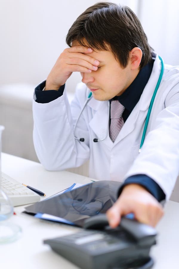 Upset Doctor Just Had Bad Phone Call Stock Photo - Image of medical ...