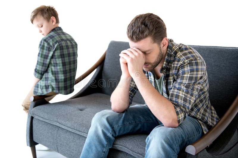 Upset Father and Son Sitting on Sofa after Quarrel Stock Image - Image ...