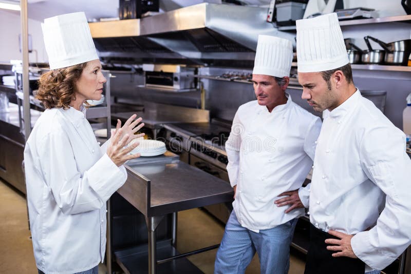 Upset Head Chef Talking To Her Team Stock Image - Image of cook ...