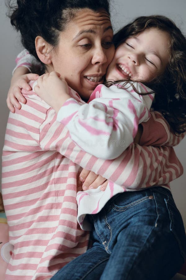 Upset Little Girl Being Consoled by Mom Stock Image - Image of ...