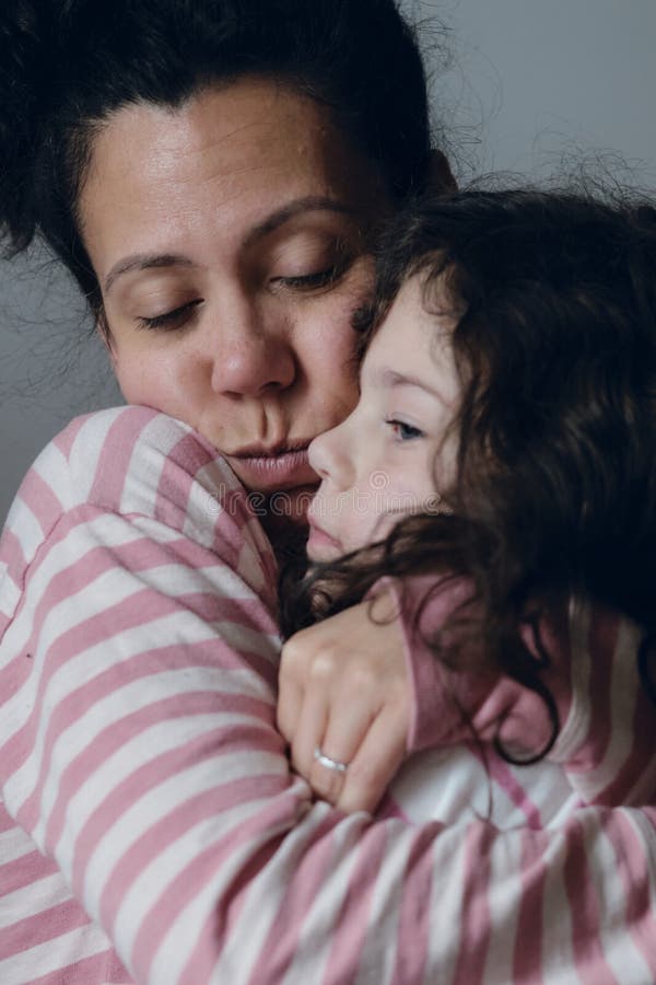 Upset Little Girl Being Consoled by Mom Stock Image - Image of ...