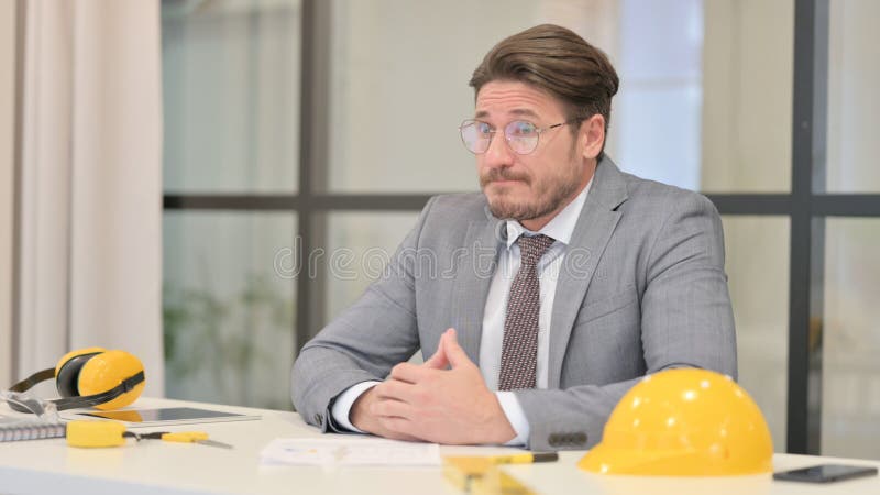 Upset Middle Aged Engineer Feeling Worried while Sitting in Office ...