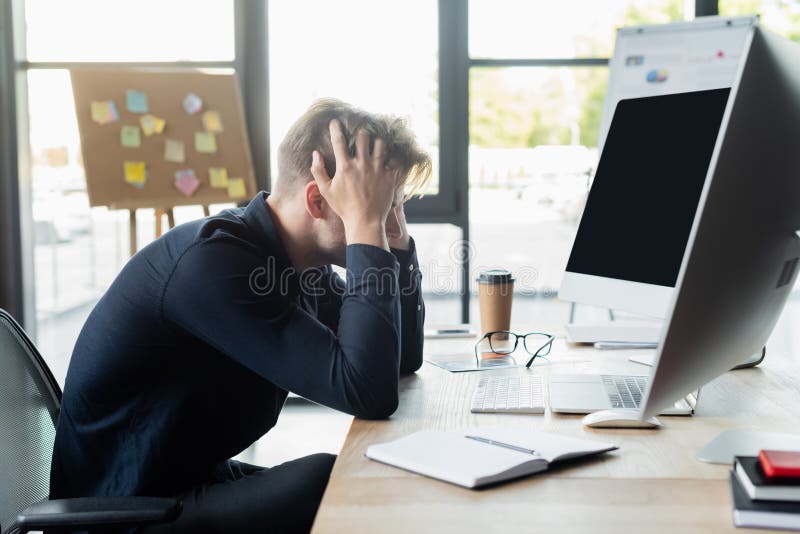 Upset Programmer Sitting Near Computer and Stock Photo - Image of ...