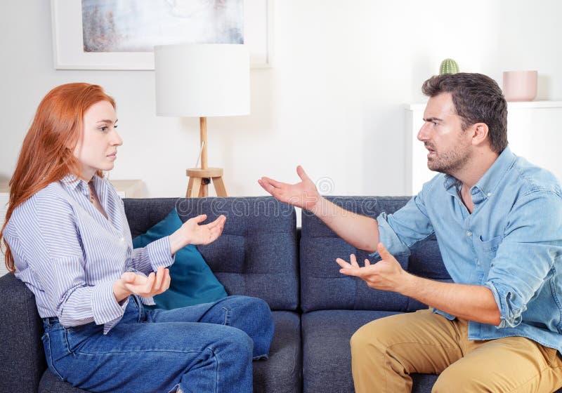 Upset and Sad Couple Arguing with Each Other on Sofa Stock Image ...
