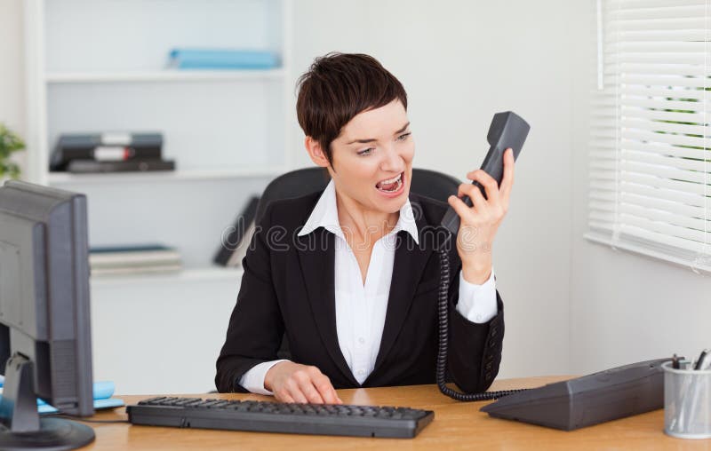Upset secretary calling stock image. Image of communication - 20361225