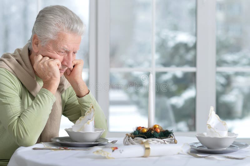 Upset senior man in cafe stock image. Image of health - 85329753