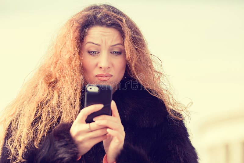 Upset Sad Skeptical Unhappy Serious Woman Talking Texting on Mobile ... Upset Sad Skeptical Unhappy Serious Woman Talking Texting on Mobile ...