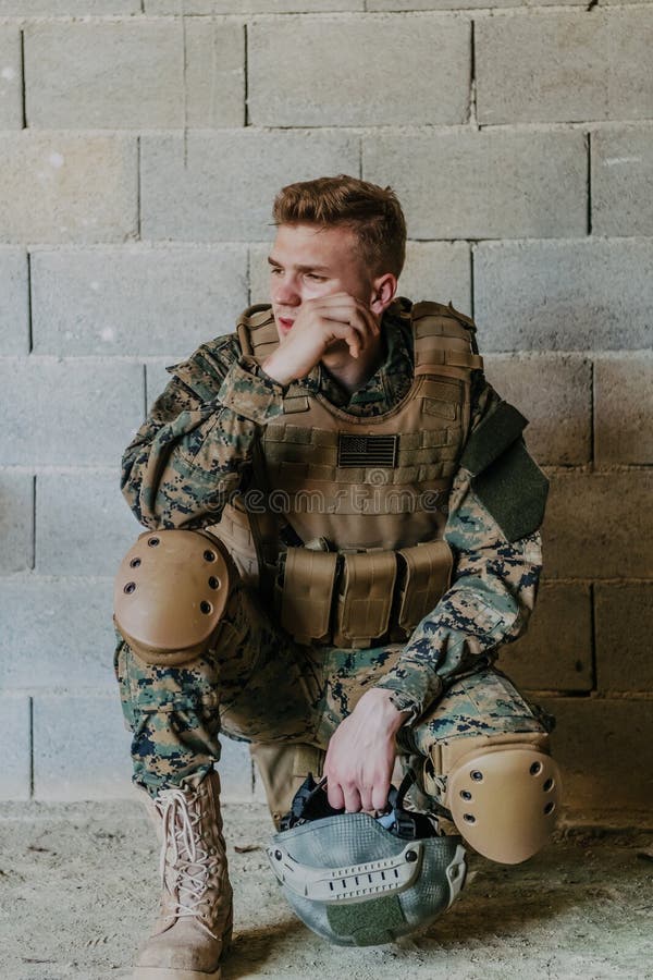Upset Soldier Has Psychological Problems Holding His Head Stock Photo ...
