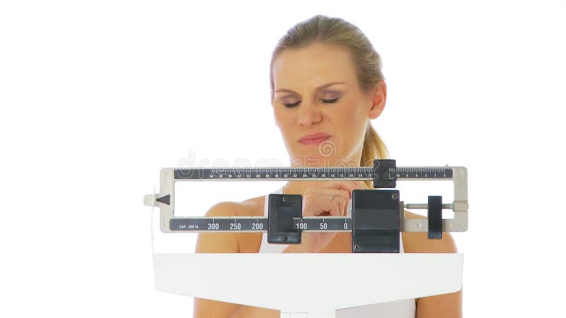 Upset woman on scale stock video. Video of caucasian - 257819187