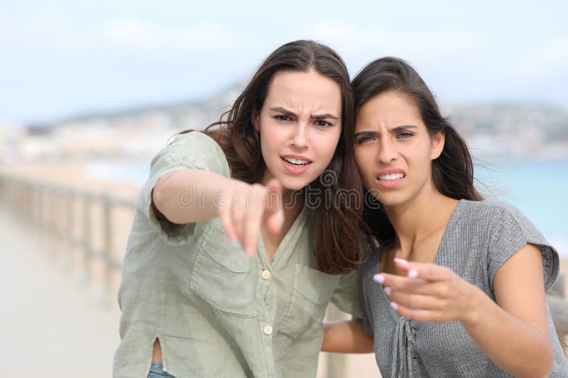 Upset Women Pointing at You on the Beach Stock Image - Image of family ...