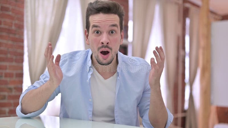 Upset Young Man Get Shocked at Home Stock Photo - Image of sadness ...