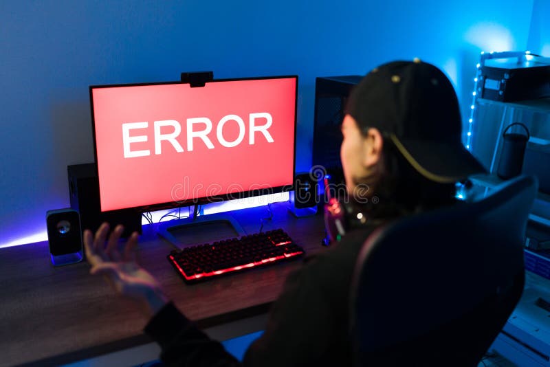 Upset Young Man Looking at an Error in a Gaming PC Stock Image - Image ...