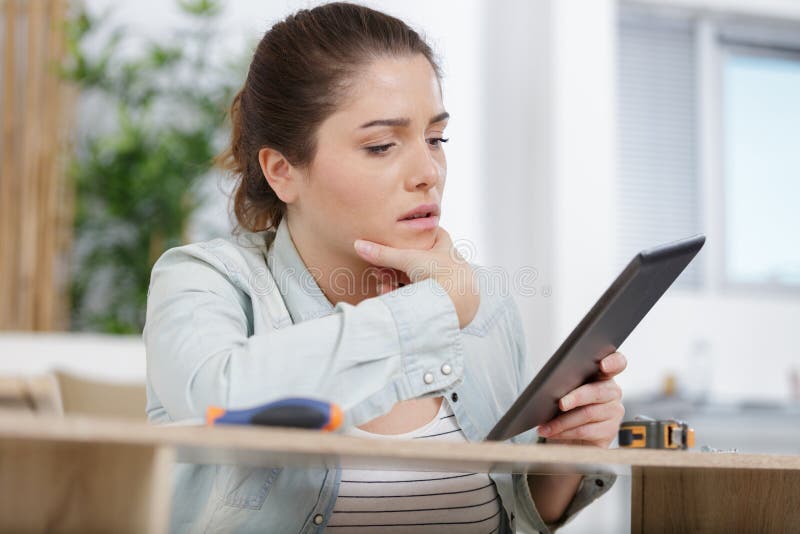 Upset Young Woman Checking Tablet Stock Image - Image of home, house ...