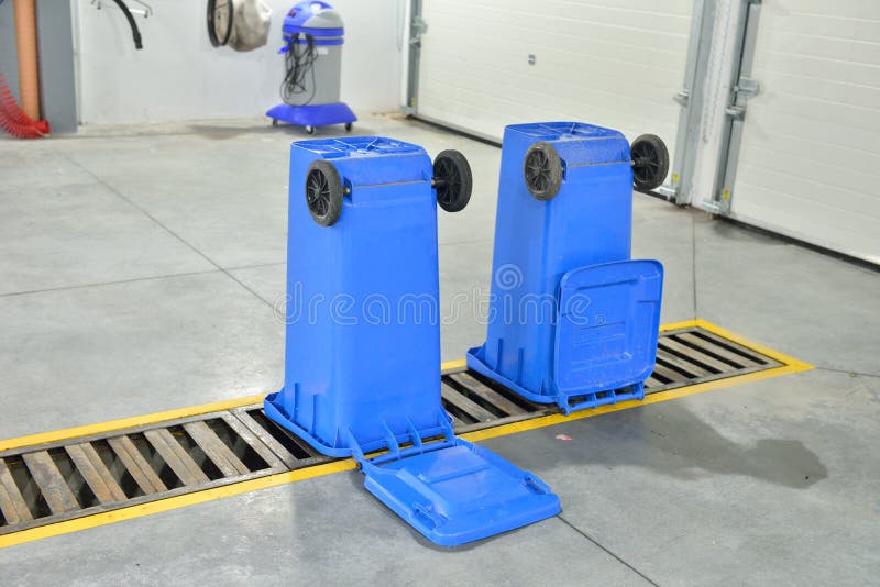 An Upside Down Blue Recycling Container on a Car Wash. Cleaning Stock ...