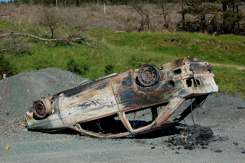 Upside down burnt-out car stock photo. Image of remote - 5121484