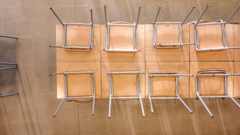 Upside Down Chairs on Desk in Classroom Stock Image - Image of ...