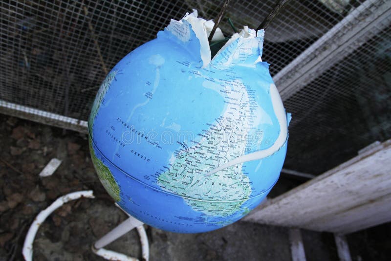 Upside Down Globe in Abandoned Place. World Upside Down Concept Stock ...