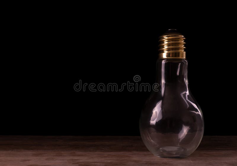 Upside Down View of a Glass Light Bulb on a Wooden Table Stock Image ...