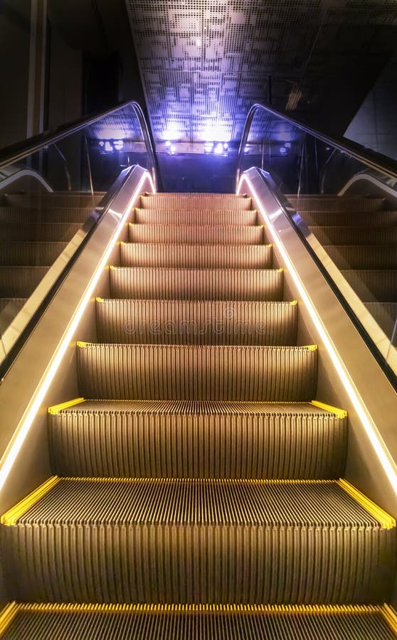 Upstairs Escalator at Night with Lights Stock Photo - Image of metal ...