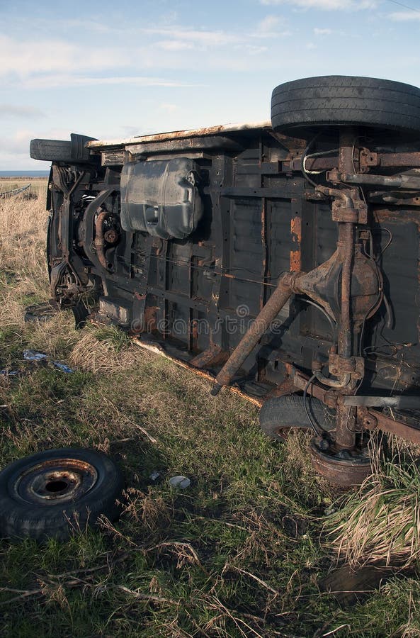 Van on Its Side on the Ground in a Breakers Yard, Stock Photo - Image ...