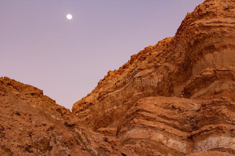 Upward View Showing Eroded Rocks and the Moon in the Desert Stock Image ...