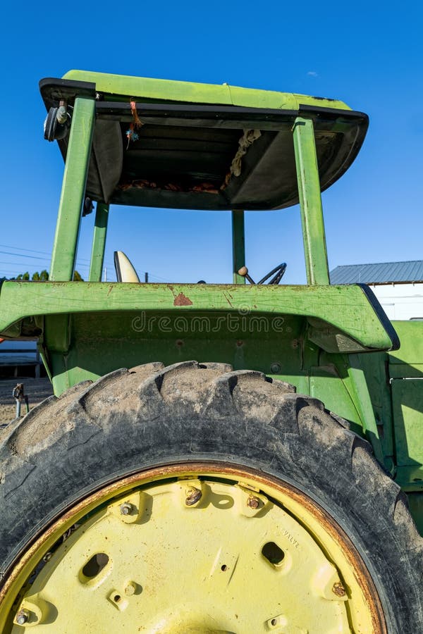 Upward View of the Tire and Cab of an Antique Tractor Stock Image ...