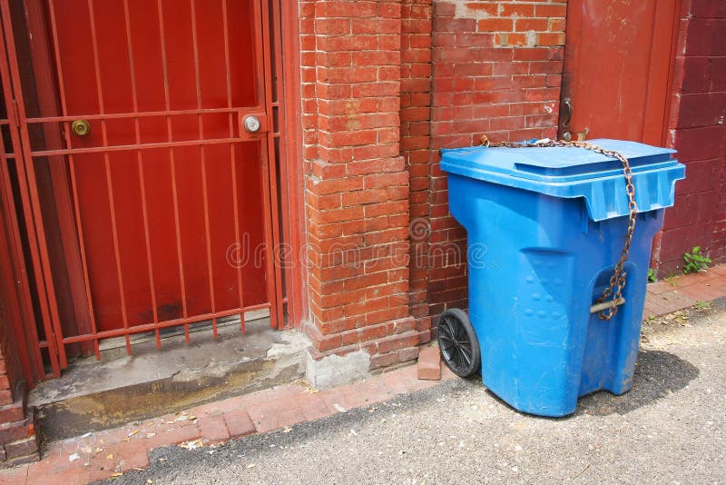 URBAN ALLEY TRASH CAN stock image. Image of street, brick - 20573071