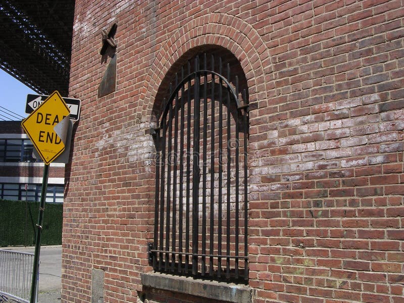 Brick Building with Dead End Sign Stock Photo - Image of lean, building ...