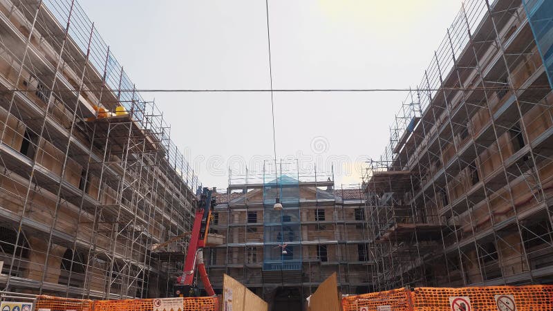 Urban Development and Construction Site with Scaffoldings on Sunny Day ...
