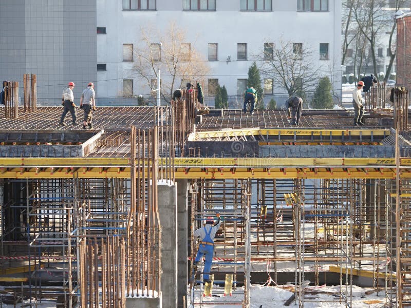 Urban Development. Construction Site in Winter during the Day. Workers ...