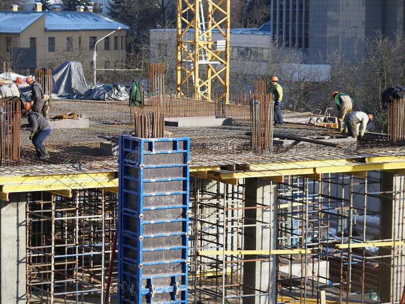 Urban Development. Construction Site in Winter during the Day. Workers ...