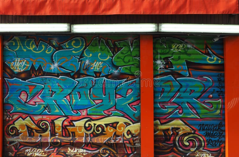 Urban Graffiti on Roller Shutter Editorial Stock Image - Image of ...