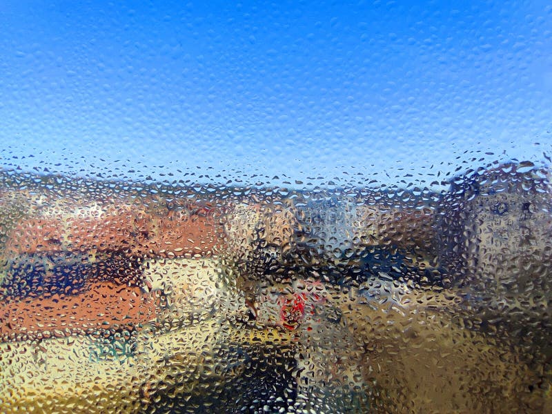 Urban Landscape Behind a Rain-soaked Window for Abstract Background ...
