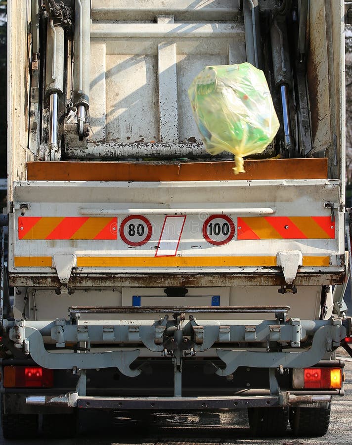 Urban Sanitation Trucks during the Collection of Solid Waste in Stock ...