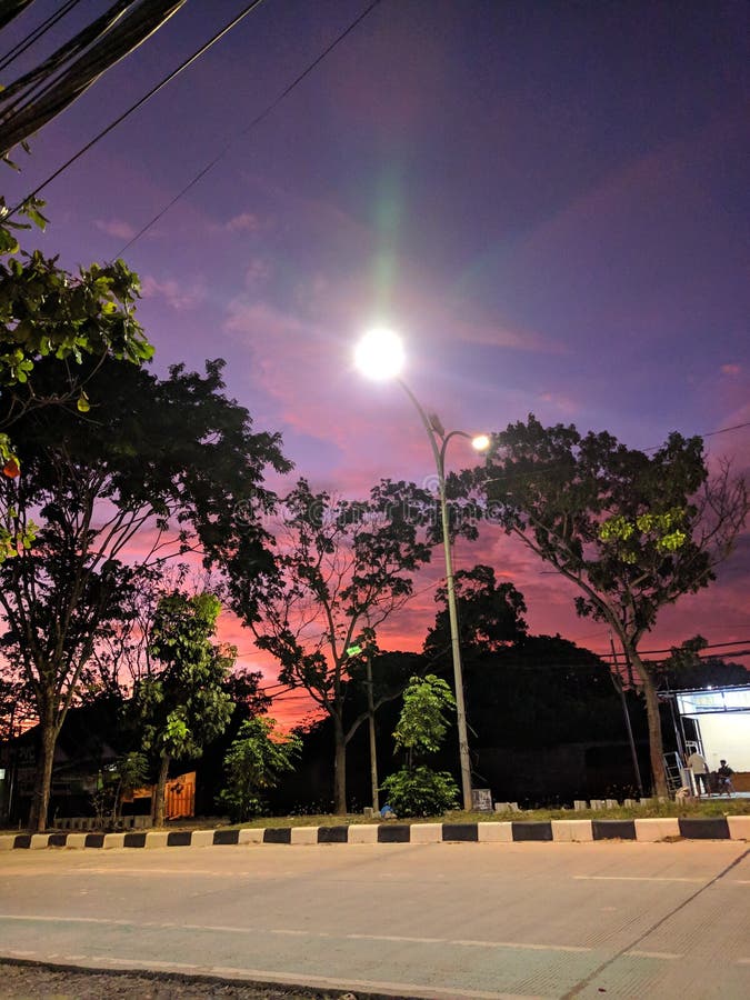 Urban society sunset road stock image. Image of sunlight - 264283119