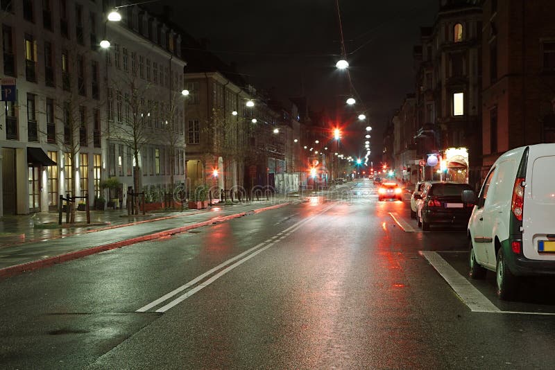 Urban street at night stock image. Image of city, road - 76762051
