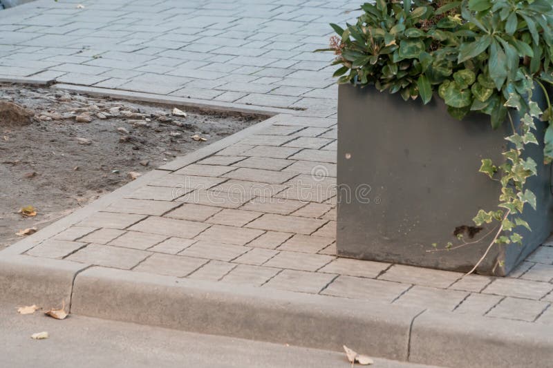 Urban Streetscape with Paved Sidewalk and Planter Box Stock Photo ...