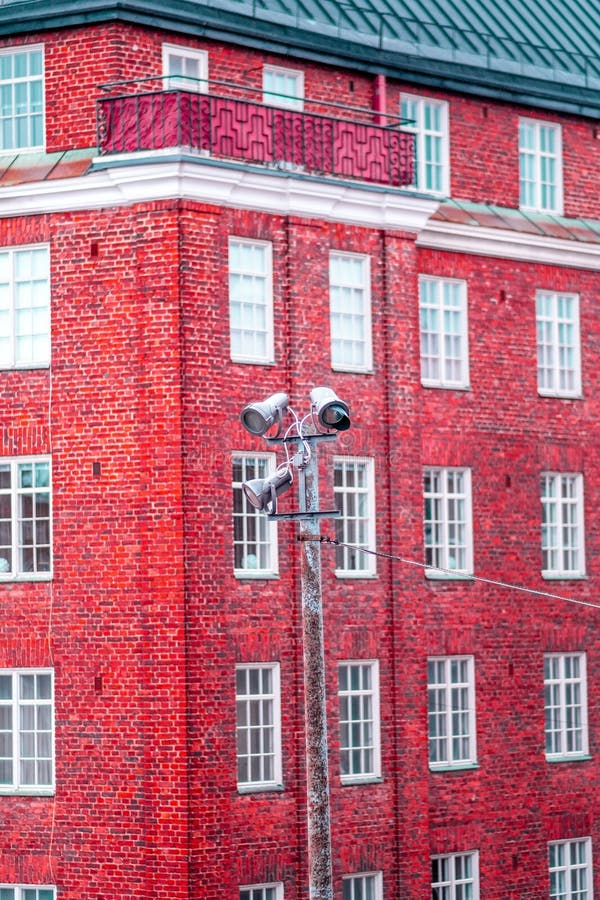 Urban Surveillance Cameras in Front of a Red Brick Building with ...