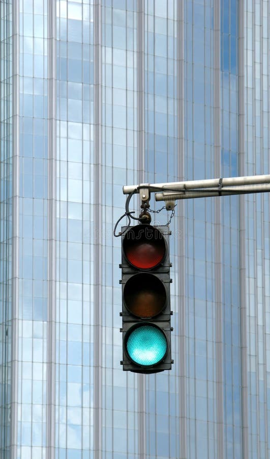 Urban Traffic Light on Green Stock Image - Image of device, stoplight ...
