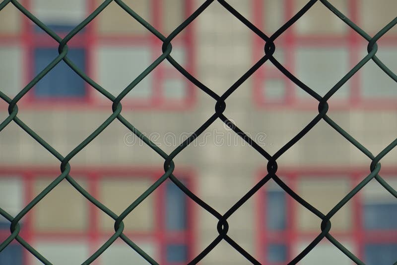 Urban View of a Building through Wire Mesh in the Foreground Stock ...